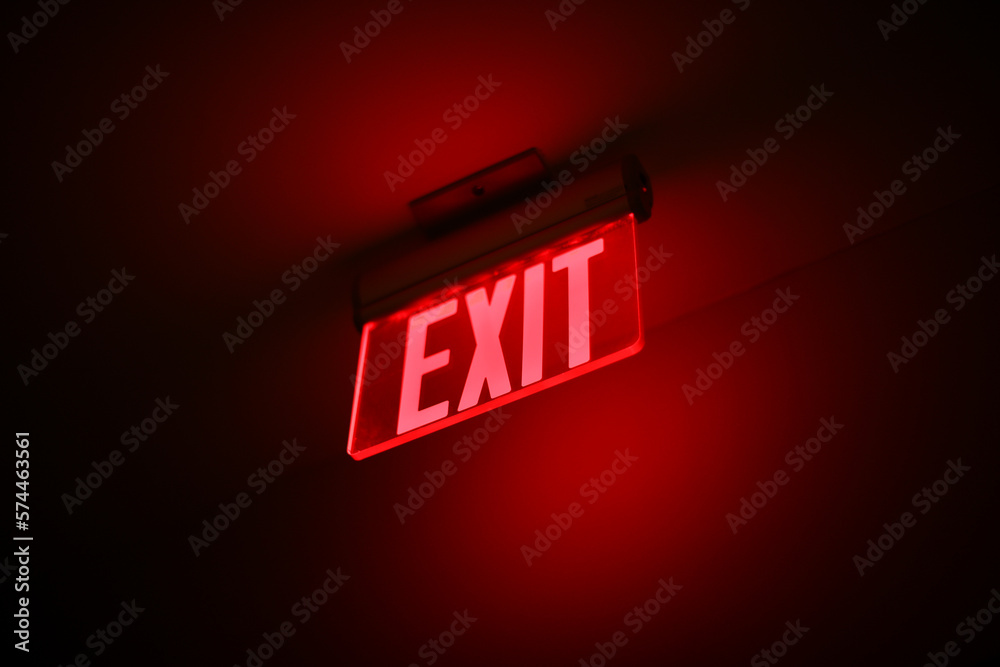 Hallway exit sign vibrant in corridor showing evacuation during ...