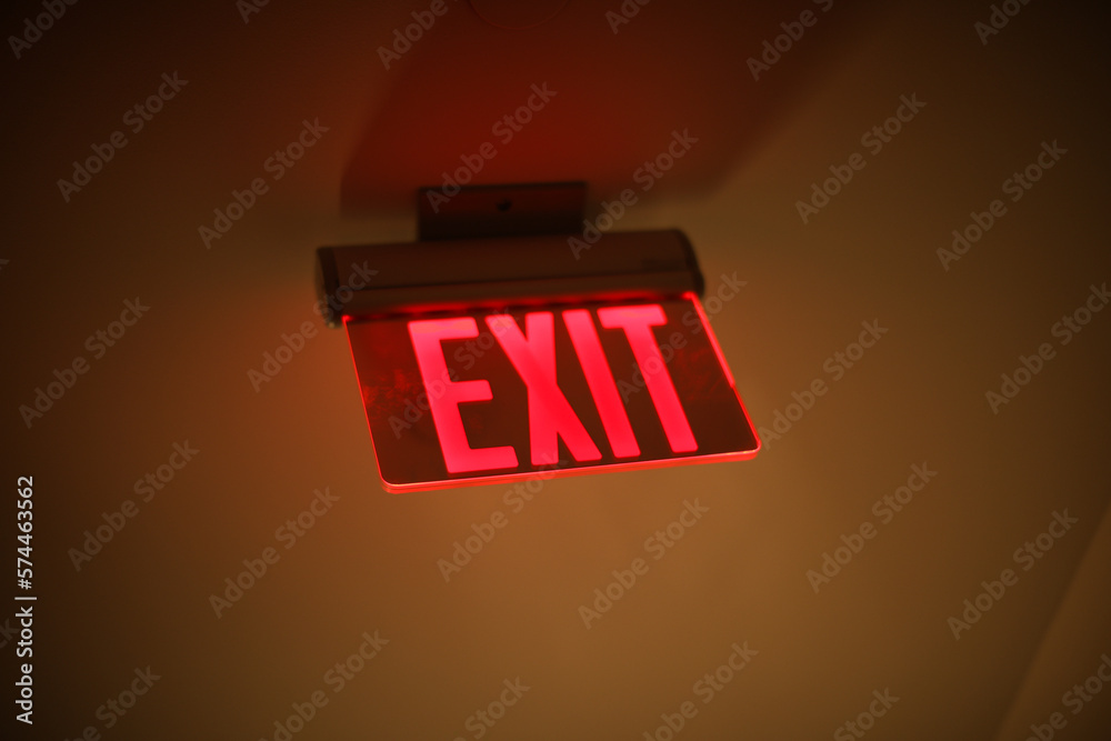 Hallway exit sign vibrant in corridor showing evacuation during ...