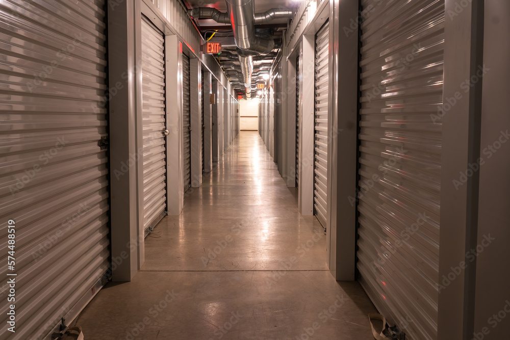 Interior climate controlled rental storage units with exit signs ...