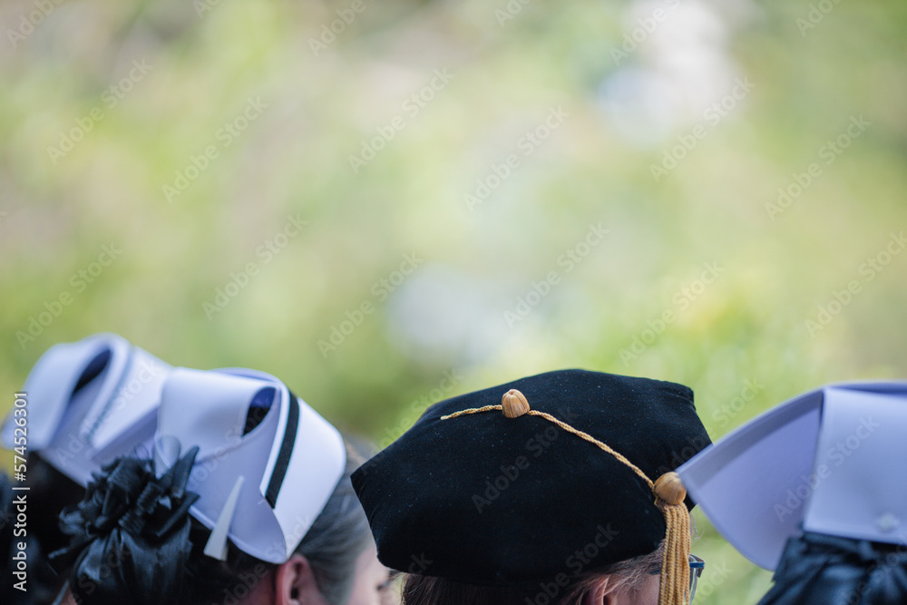 back view The group of graduates celebrated their college graduation ...
