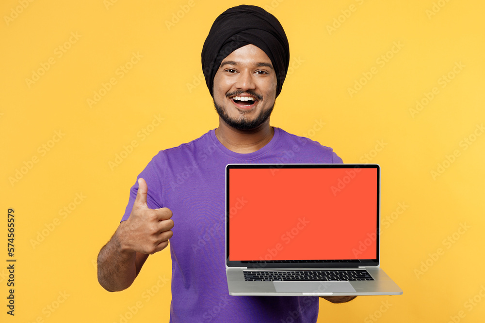 Devotee Sikh Indian IT man ties traditional turban dastar wears purple ...