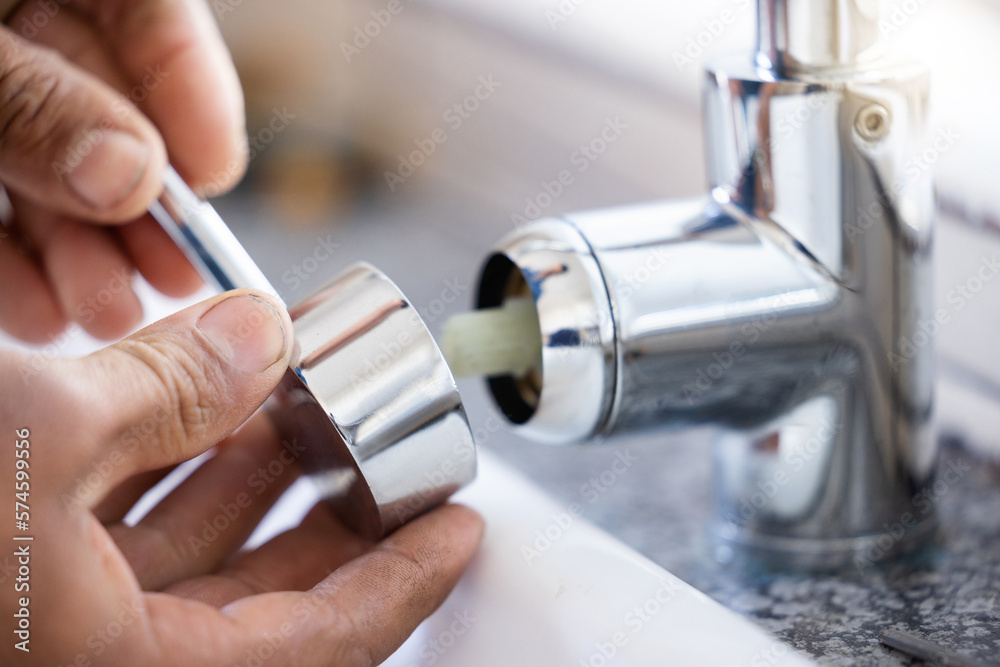 Plumber, hands and faucet, plumbing and maintenance with man, manual ...
