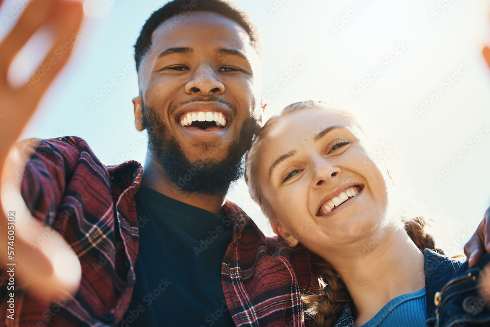 Interracial Love Couple Selfie And Laughing At Funny Joke Outdoors