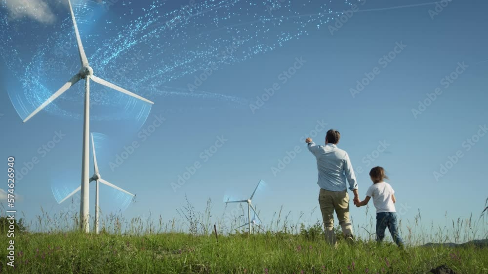 Father And Daughter Walking Through Wind Farm. Professional Male ...