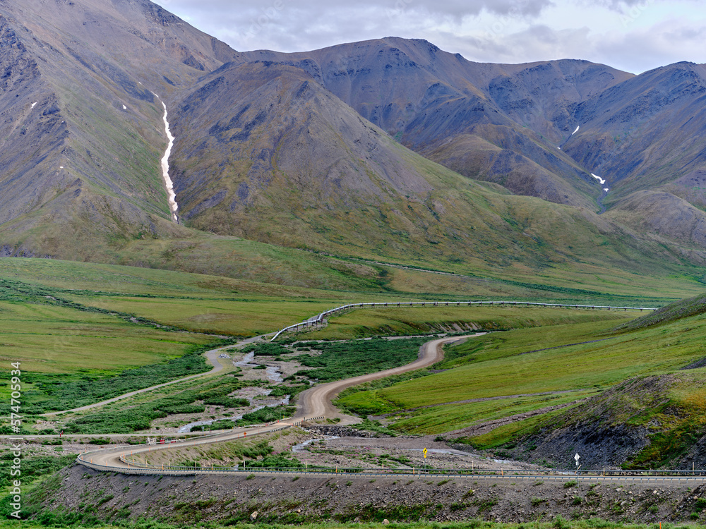 The foot hills of the Brooks range of mountains with the Sag River and ...