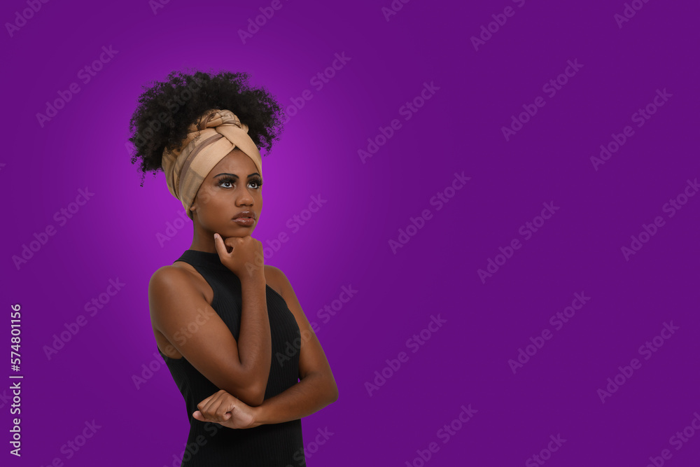thoughtful woman positioned on the left side of the image on purple ...