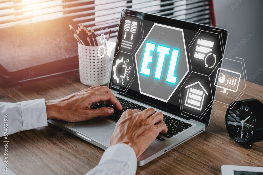 ETL extract transform load concept, Person using laptop with extract ... ETL extract transform load concept, Person using laptop with extract ...