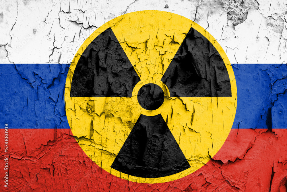 Flag of Russia painted on a concrete with nuclear weapon sign. Russian ...