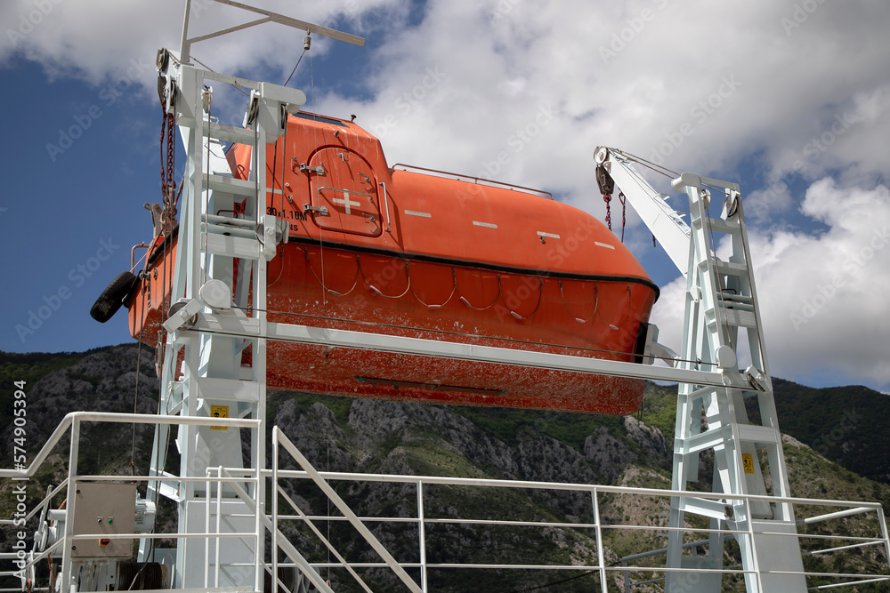 Lifeboat on a davit crane Stock Photo | Adobe Stock