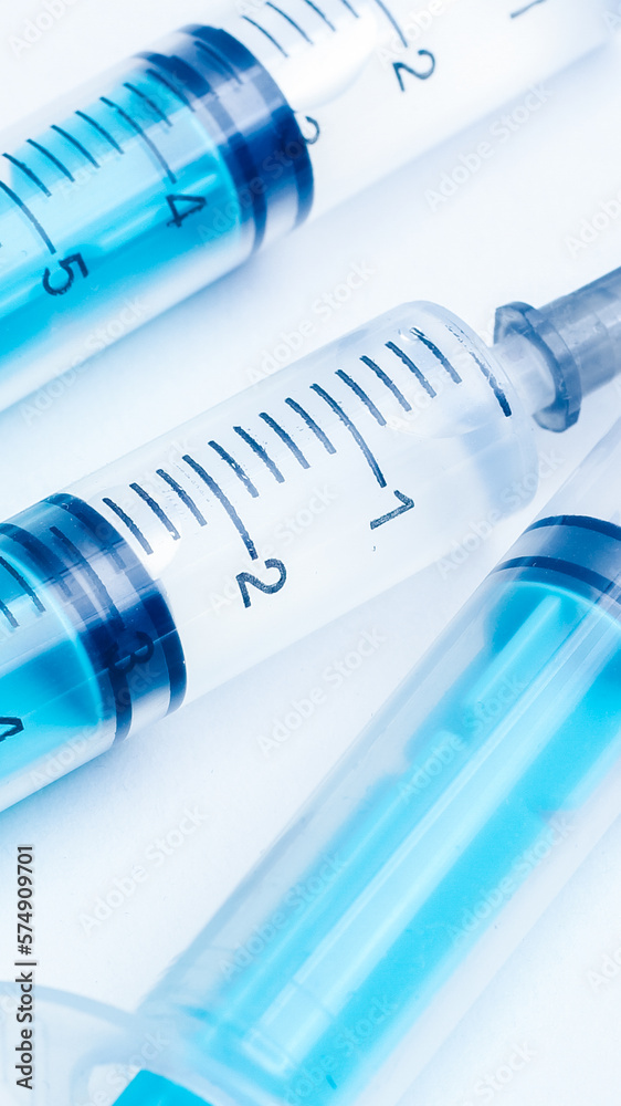 Disposable plastic syringe prepared for injection and vaccination in ...