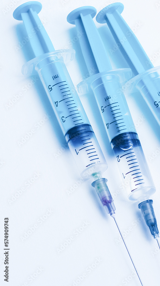 Disposable plastic syringe prepared for injection and vaccination in ...