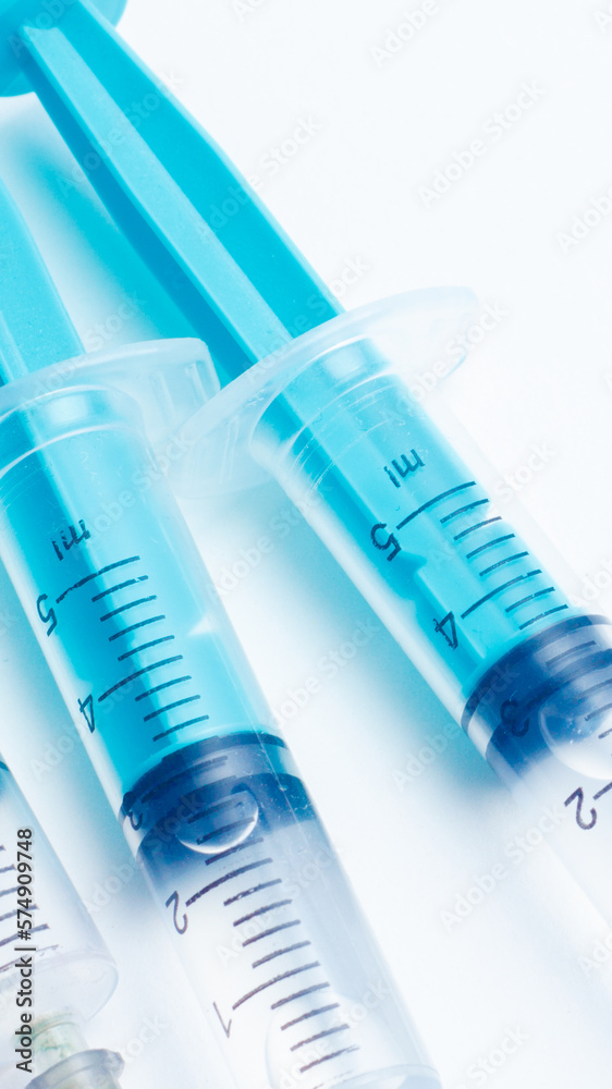 Disposable plastic syringe prepared for injection and vaccination in ...