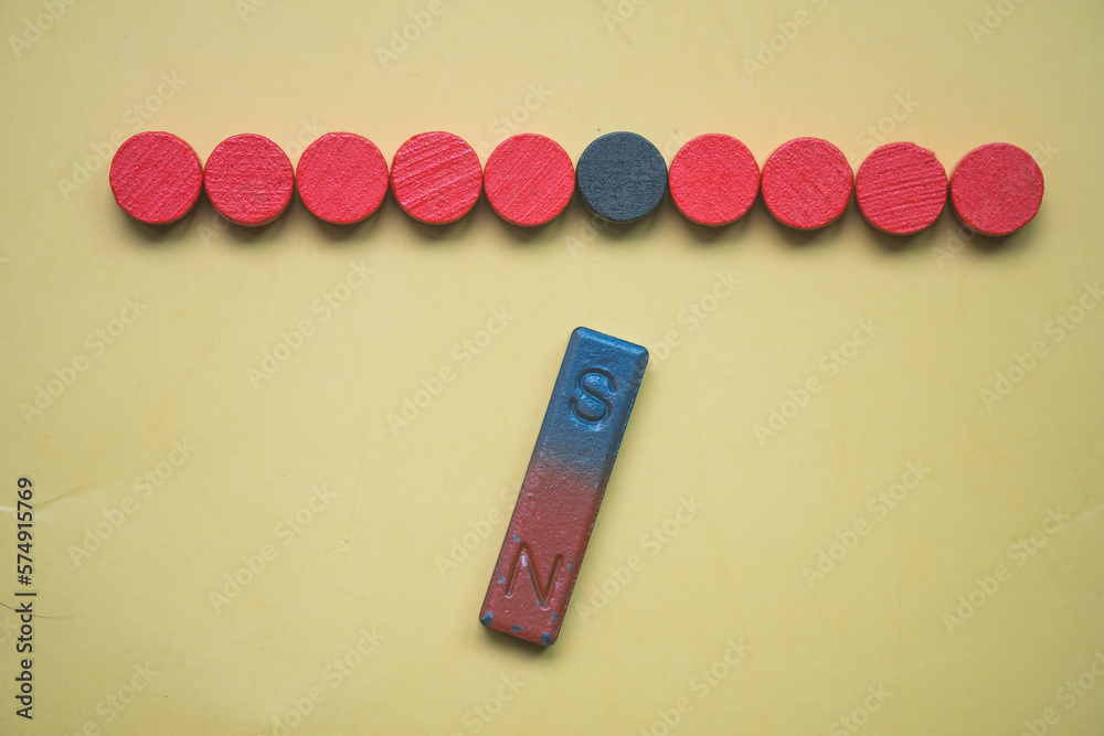 Red and blue bar magnet or physics magnetic attract selects one wood ...