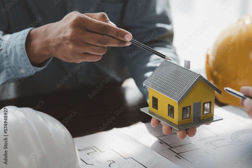 Architects and engineers are working together to edit the draft house ...