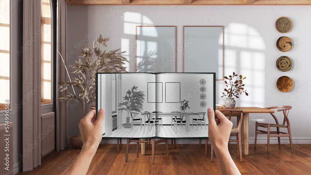 Hands holding notepad with boho style dining room blueprint sketch or ...