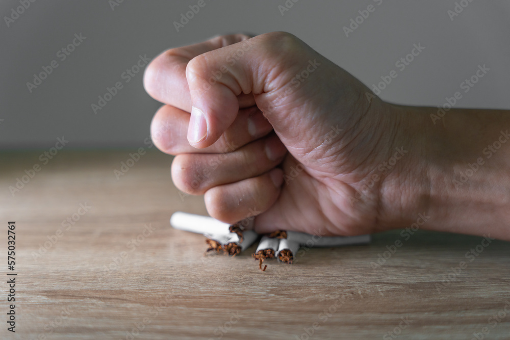 No smoking. Man stop smoke, refuse, reject, destroy, smash cigarette ...