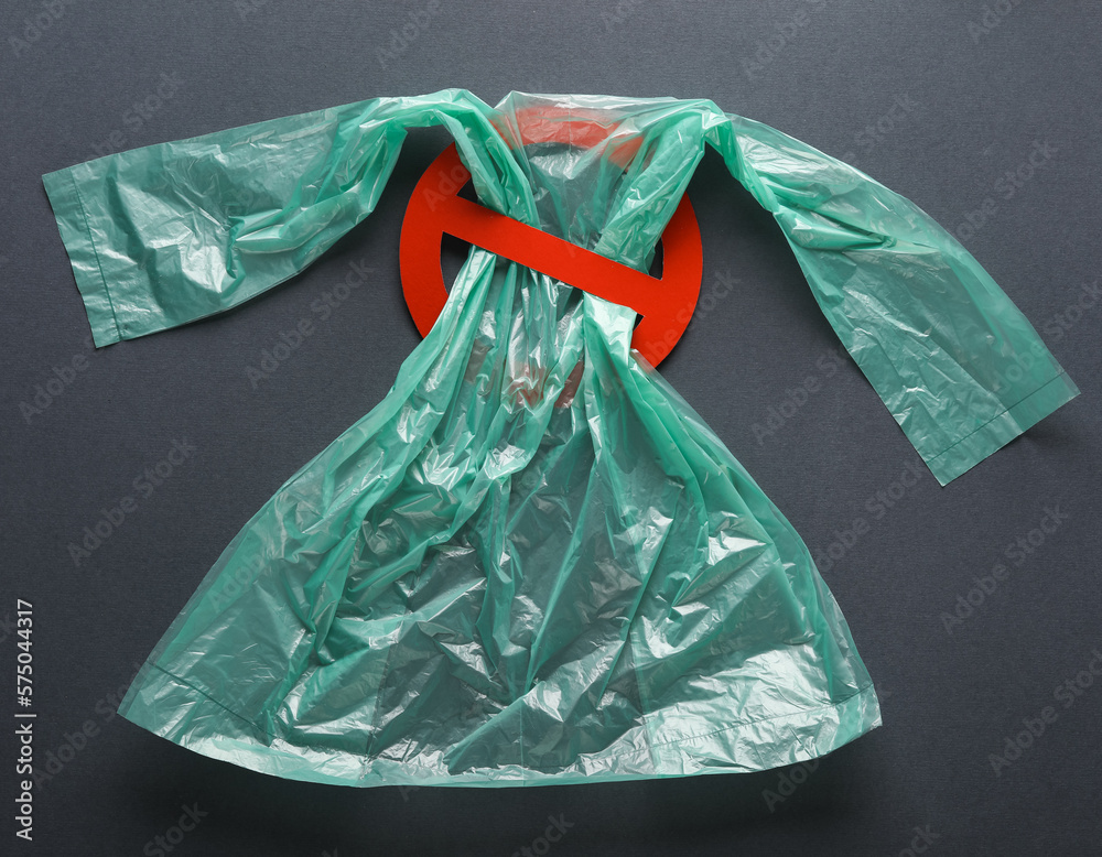 Plastic bag with red prohibition sign on dark background. Plastic free ...