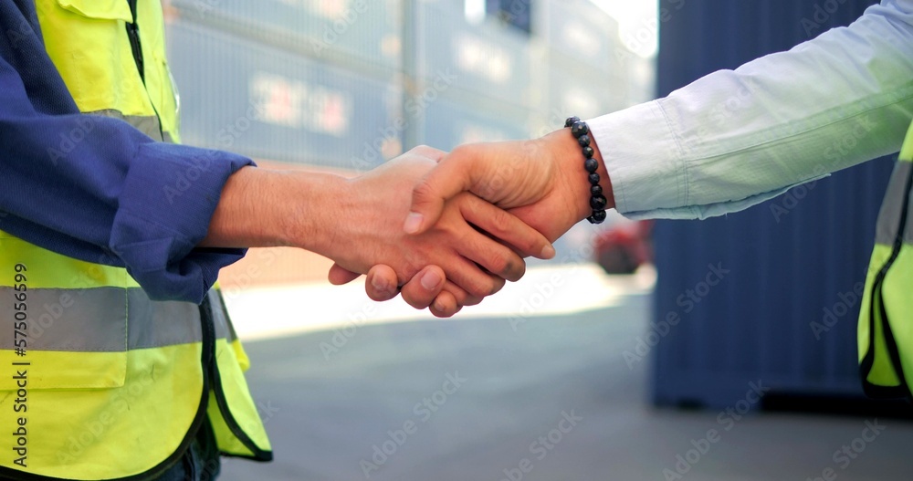 Handshake in construction site industrial worker on factory warehouse ...