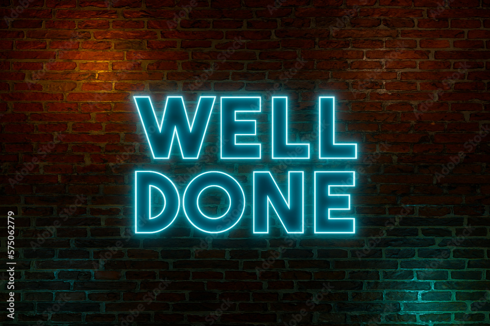 Well done. Brick wall at night with the text "Well done" in blue neon ...