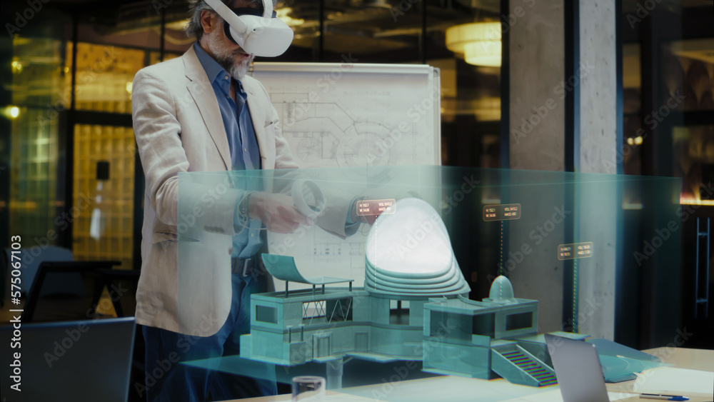 Architect designer in VR goggles presents new architecture project in ...