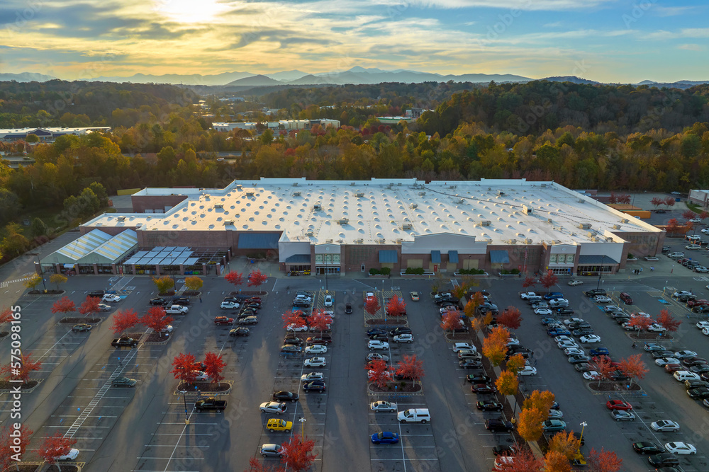 Aerial view grocery shopping mall and many colorful cars parked on ...