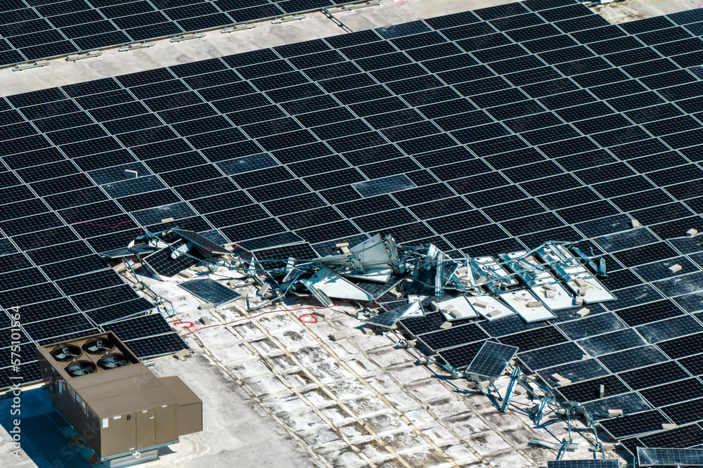 Broken down photovoltaic solar panels destroyed by hurricane Ian winds ...