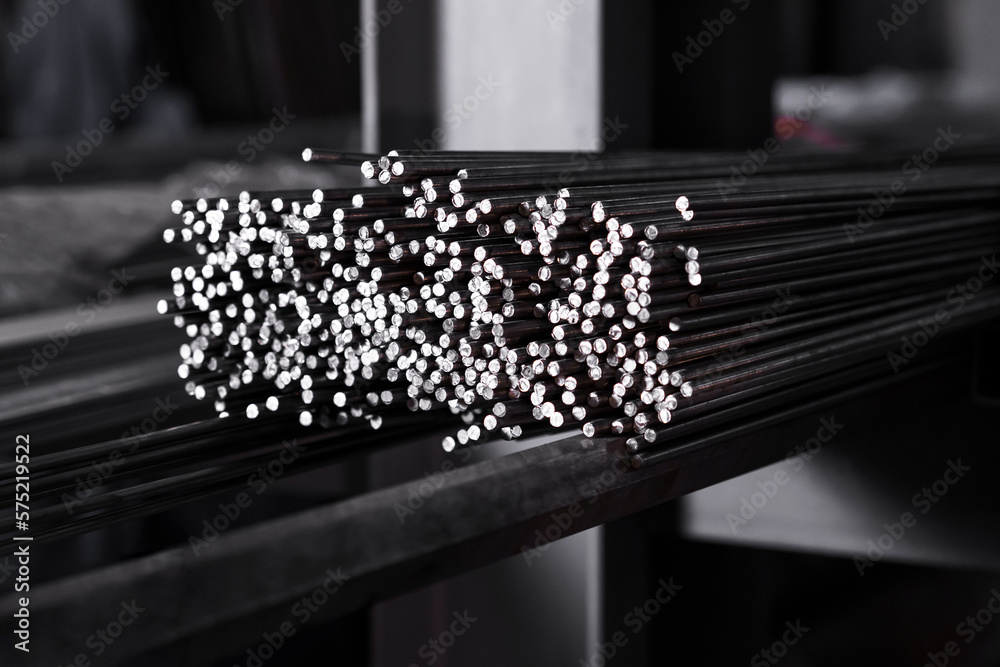 Round metal billet, warehouse of metal billets in production Stock ...