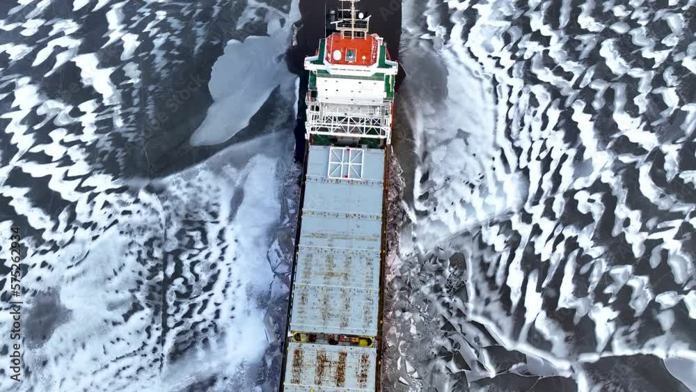 Stockvideon A big red ship frozen in the endless sea of ice. Aerial ...