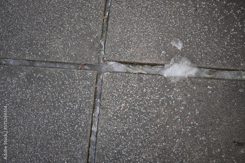 asphalt soviet square concrete tile, asphalt tile covered with thin ice ...