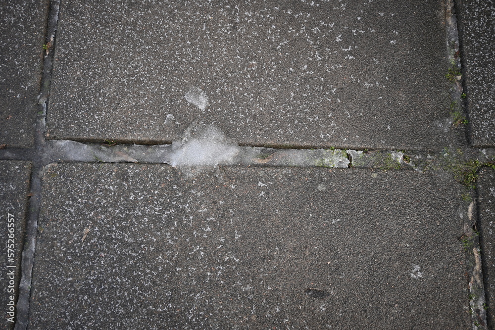 asphalt soviet square concrete tile, asphalt tile covered with thin ice ...