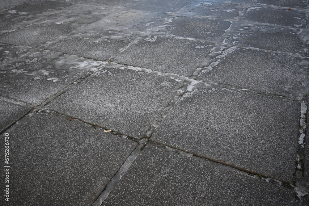 asphalt soviet square concrete tile, asphalt tile covered with thin ice ...
