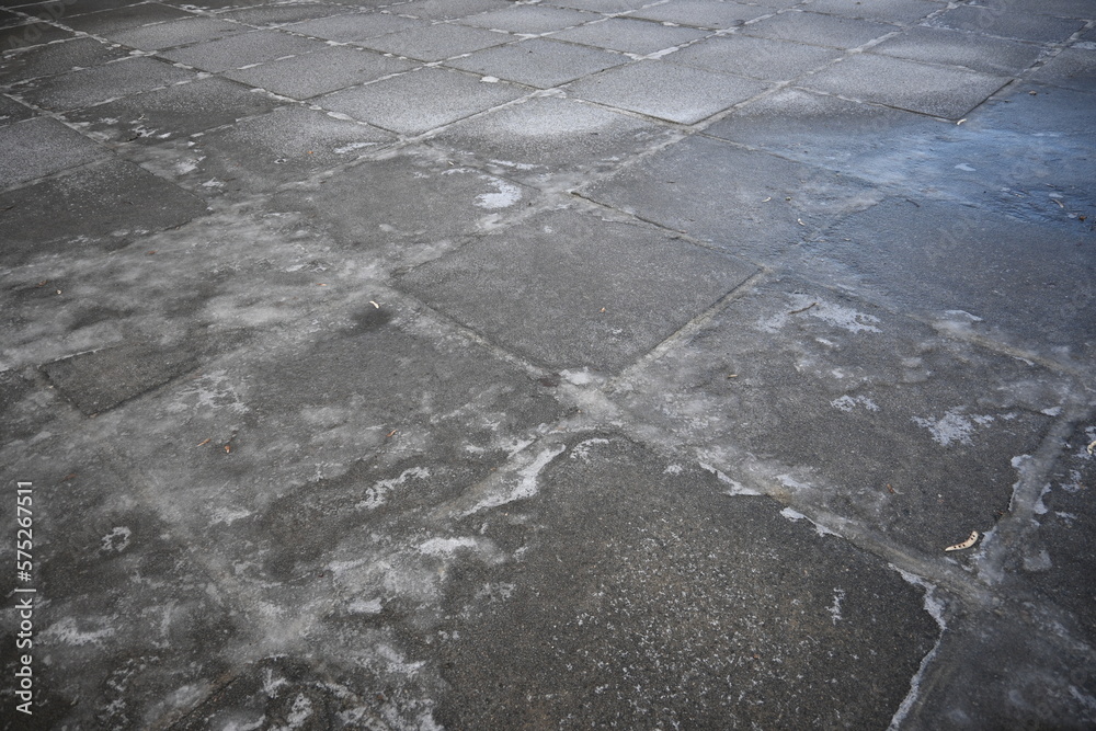 asphalt soviet square concrete tile, asphalt tile covered with thin ice ...