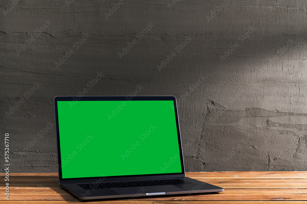 Chroma key green screen, angled view laptop on table Stock Photo ...