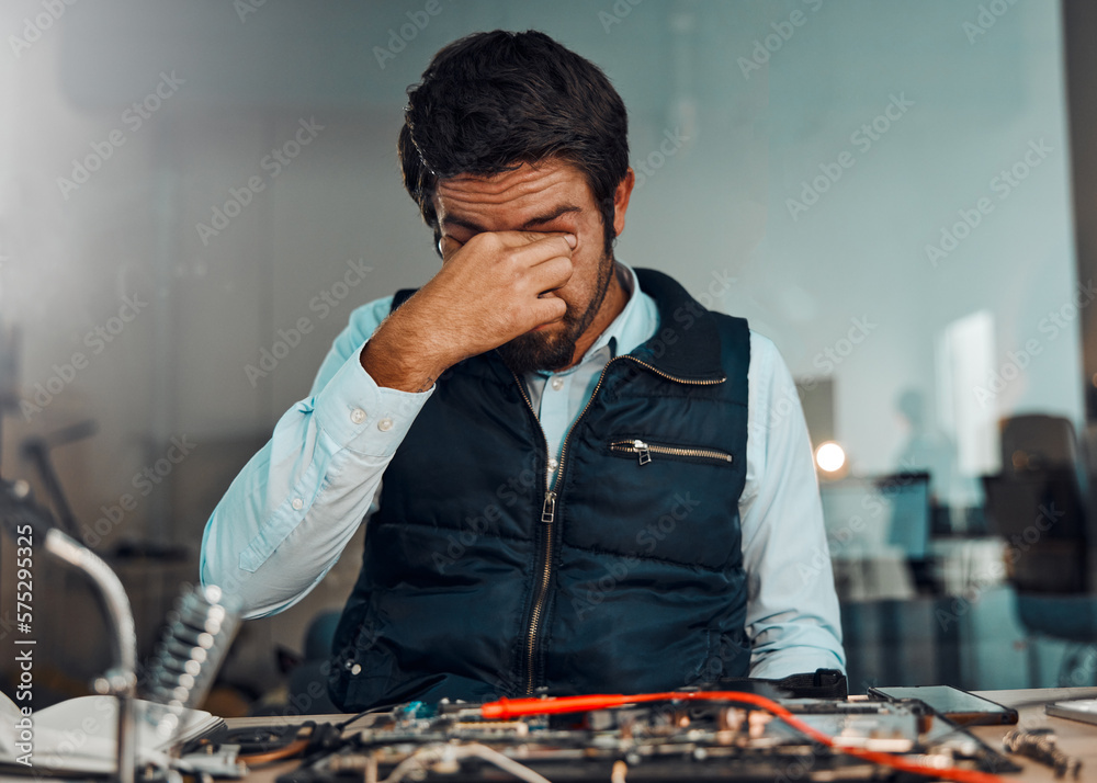 Tired, headache and man in technology repair, service and maintenance ...