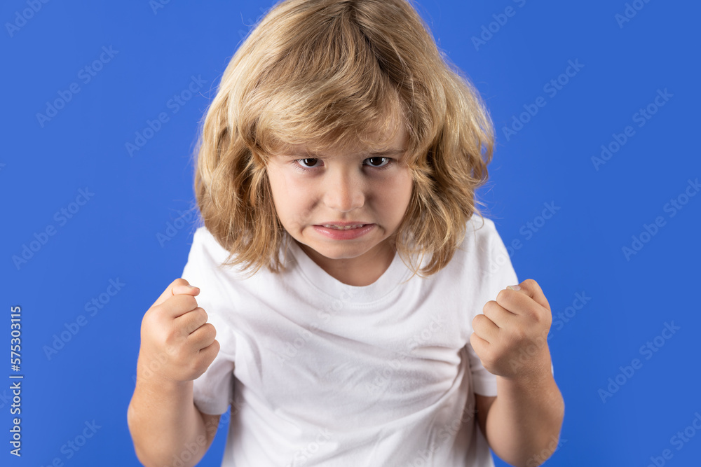 Child with angry expression. Angry hateful little boy, child furious ...