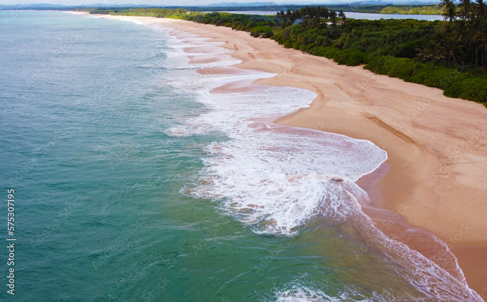 Aerial view of the long sandy tropical ocean shore. Beautiful tropical ...