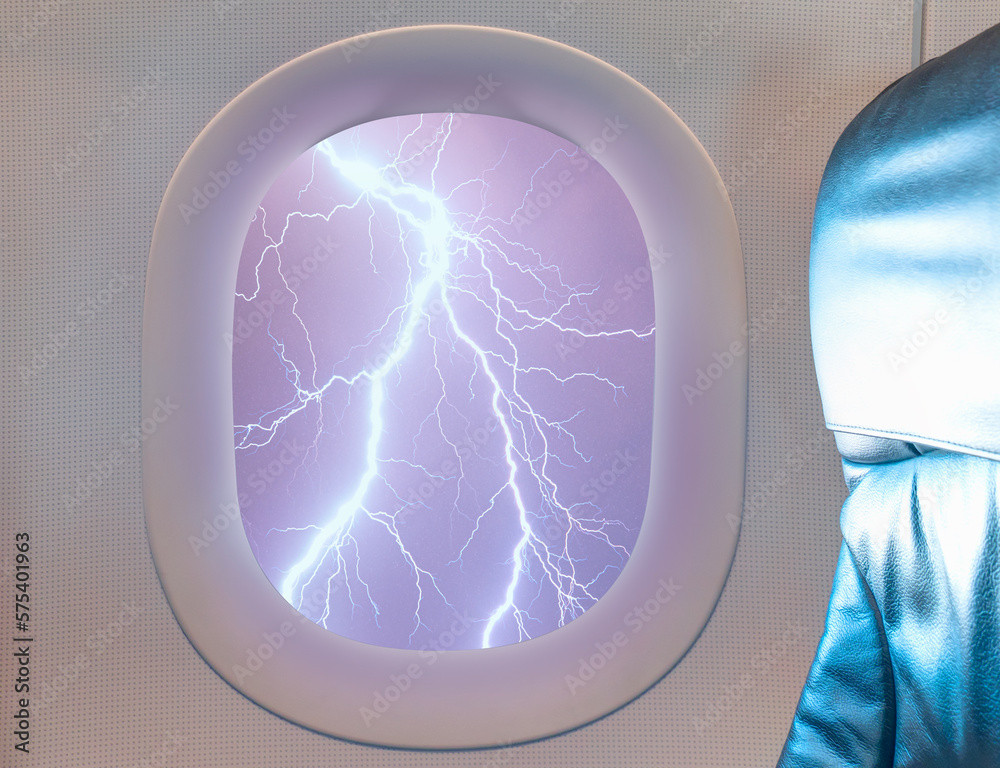 Lightning storm from as seen through window of an commerical passenger ...
