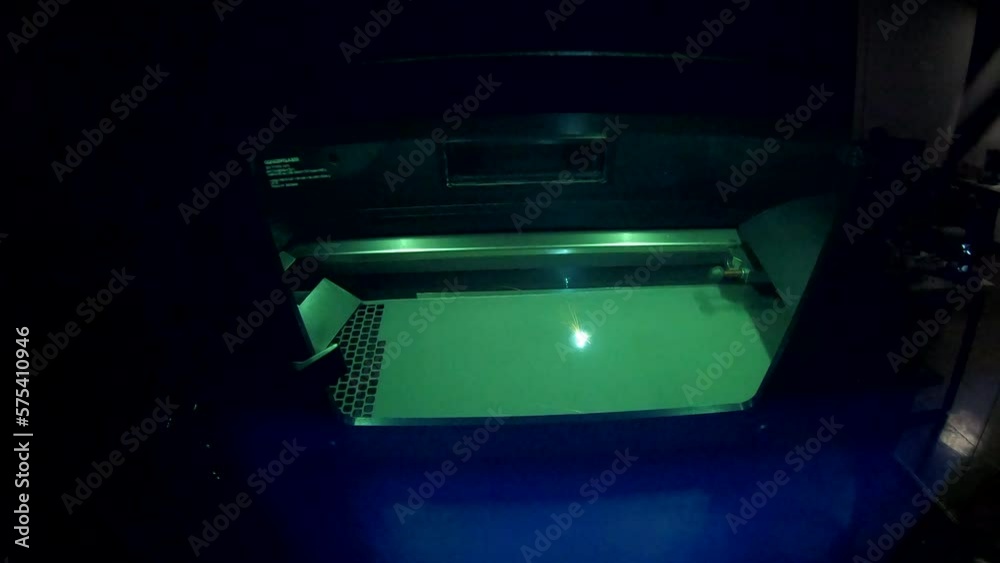 3D printer printing object from metal powder in working chamber by ...