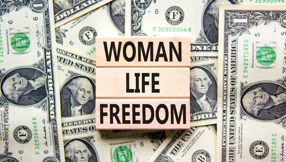 Woman life freedom symbol. Concept words Woman Life Freedom on wooden ...