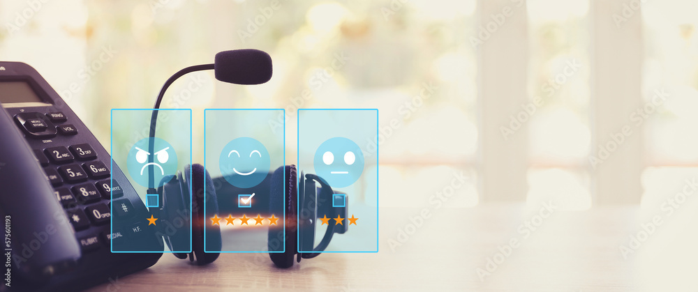 Customer service concept. Close-up headphone and telephone for ...