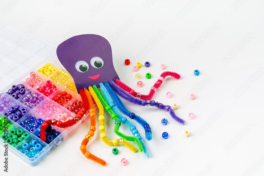 Funny octopus made of beads and pipe cleaners with different colorful ...