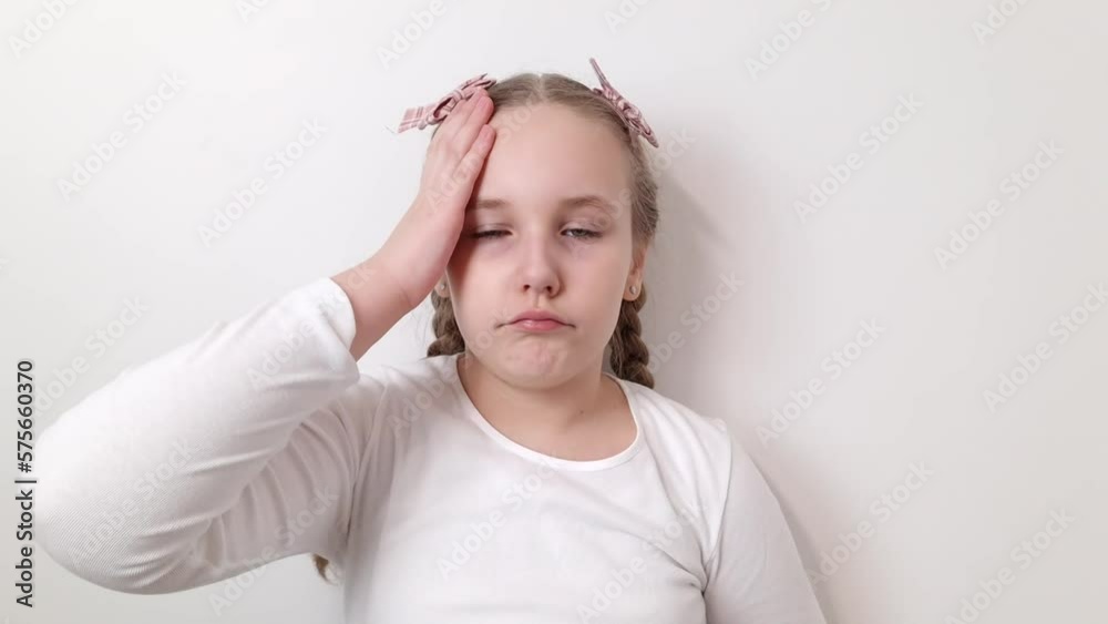 Little caucasian girl making facepalm gesture, feeling shame and regret ...