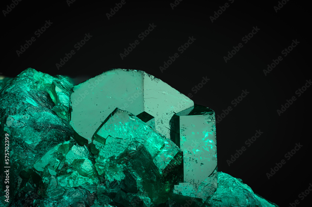 Dioptase crystal on black background. macro detail texture background ...