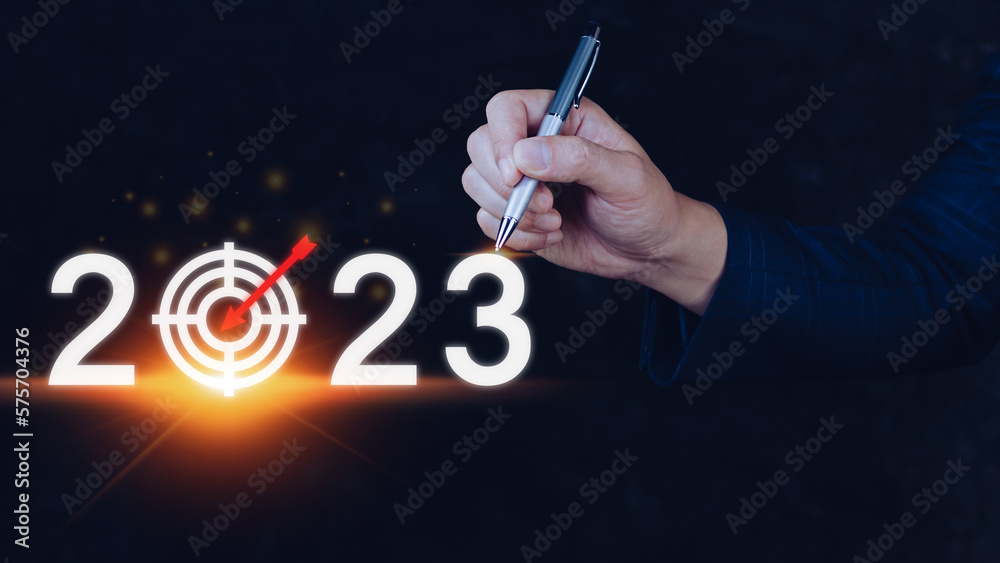 Business target and goal 2023 icon, hand pointing holding 2023 virtual ...