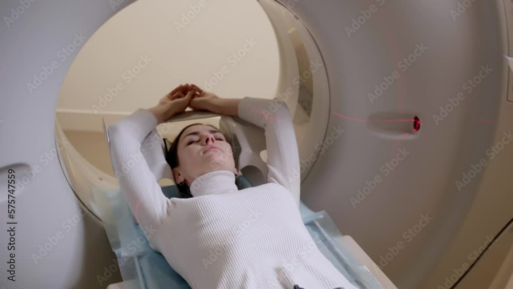 4k video CT scanning of abdomen of woman in medical clinic. Girl ...