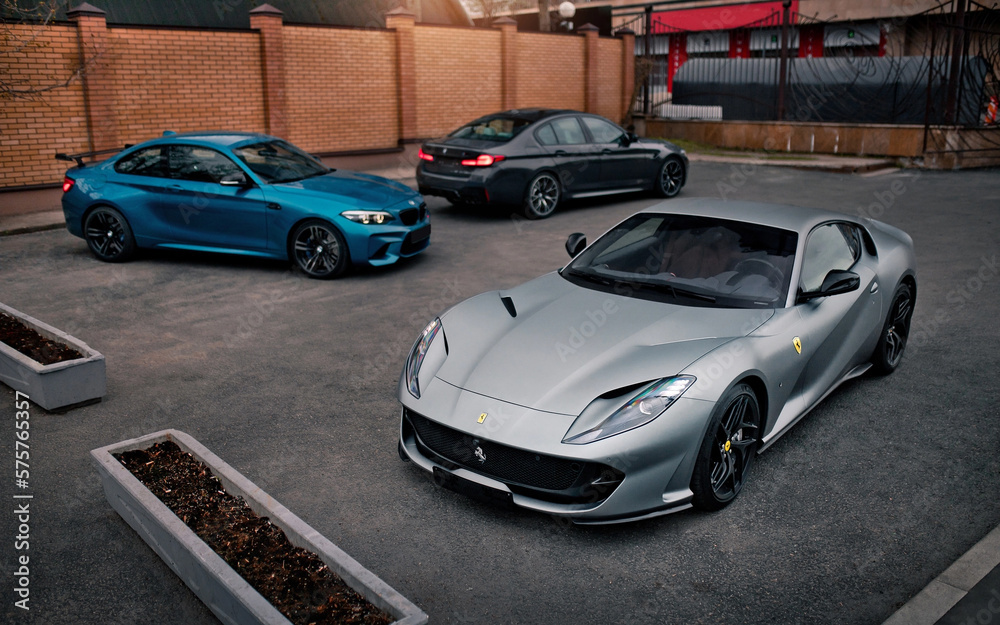 October 2022. Blue BMW M2 (F87) & Matte silver Ferrari 812 Superfast ...