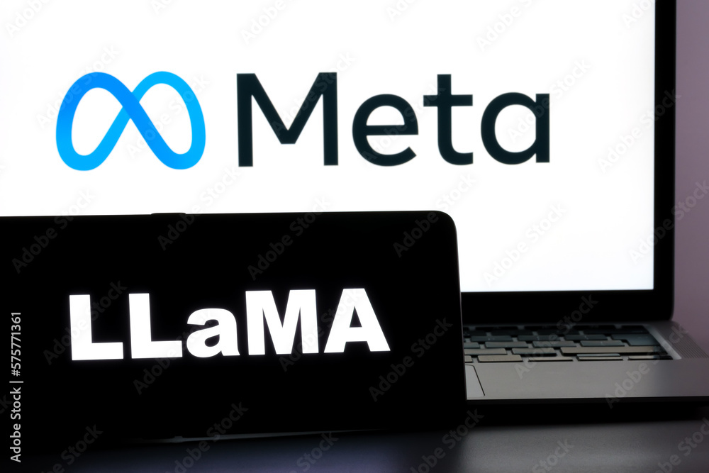 LLaMA letters seen on smartphone and blurred Meta company logo on ...