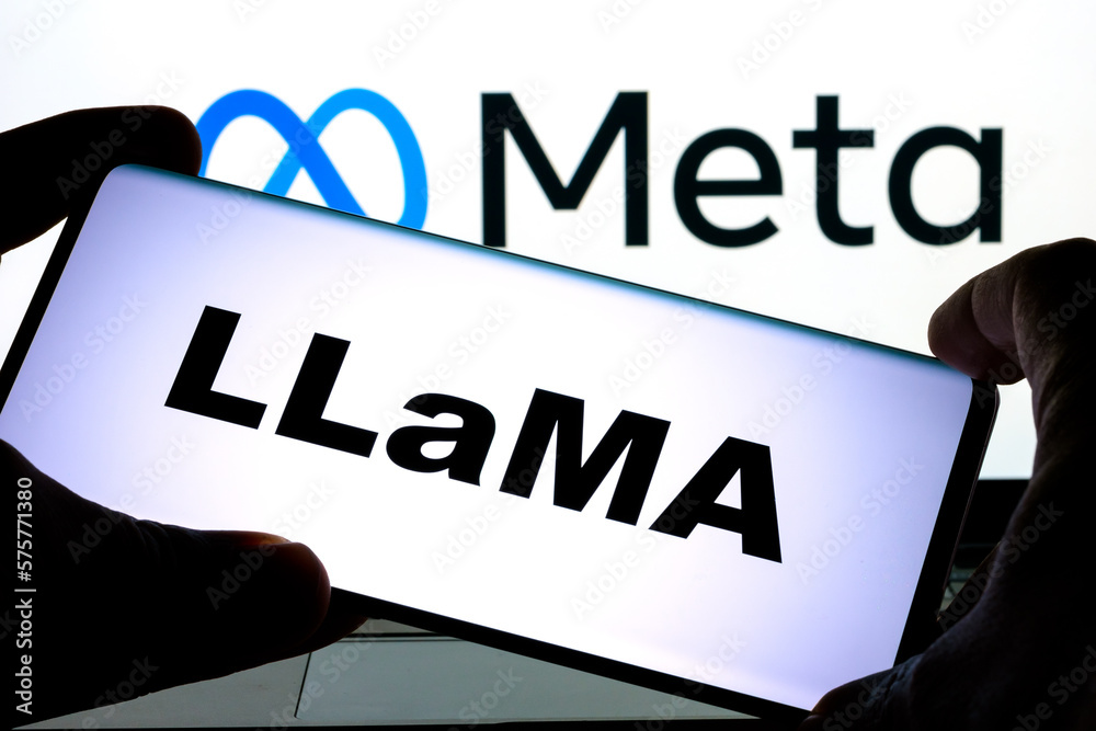 LLaMA letters seen on smartphone and blurred Meta company logo on ... LLaMA letters seen on smartphone and blurred Meta company logo on ...