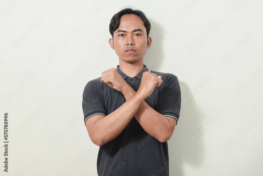 crossed and clenched hand symbol or x hand. gesture or symbol of international women's day ...