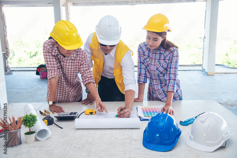 Civil Construction engineer teams shaking hands together wear work ...